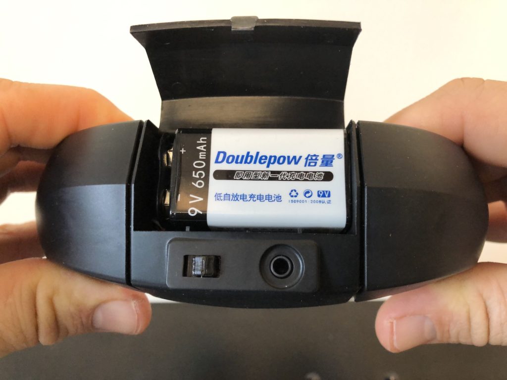 Gently press the battery door closed until you hear a click.